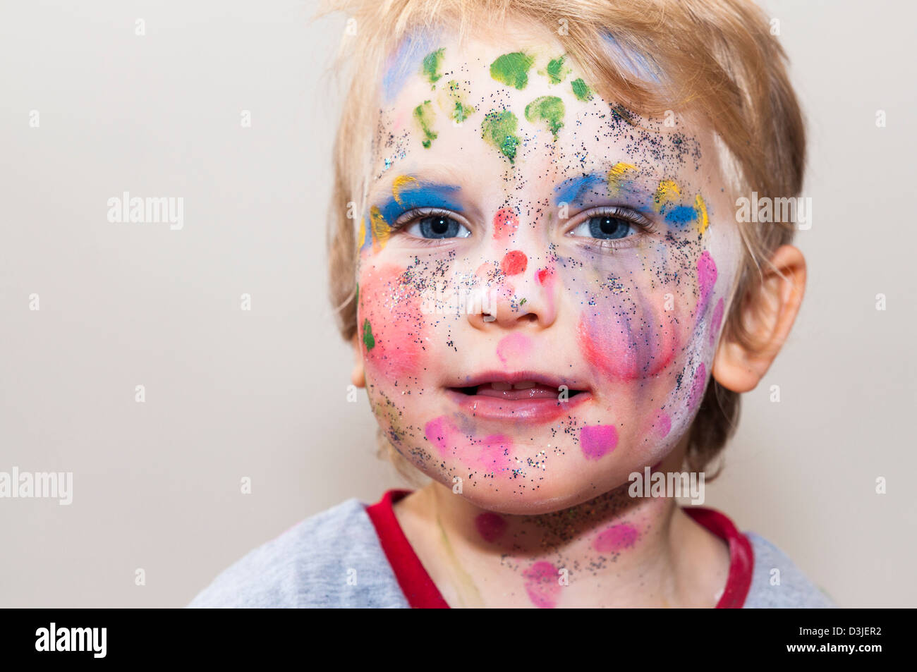 Young girl with decorated painted face Stock Photo - Alamy