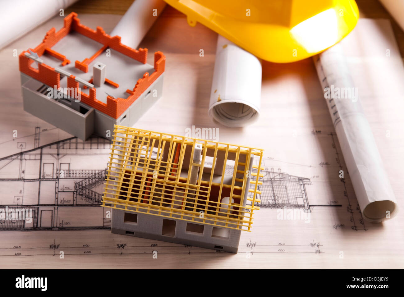 Architectural plans of house and hard hat Stock Photo - Alamy