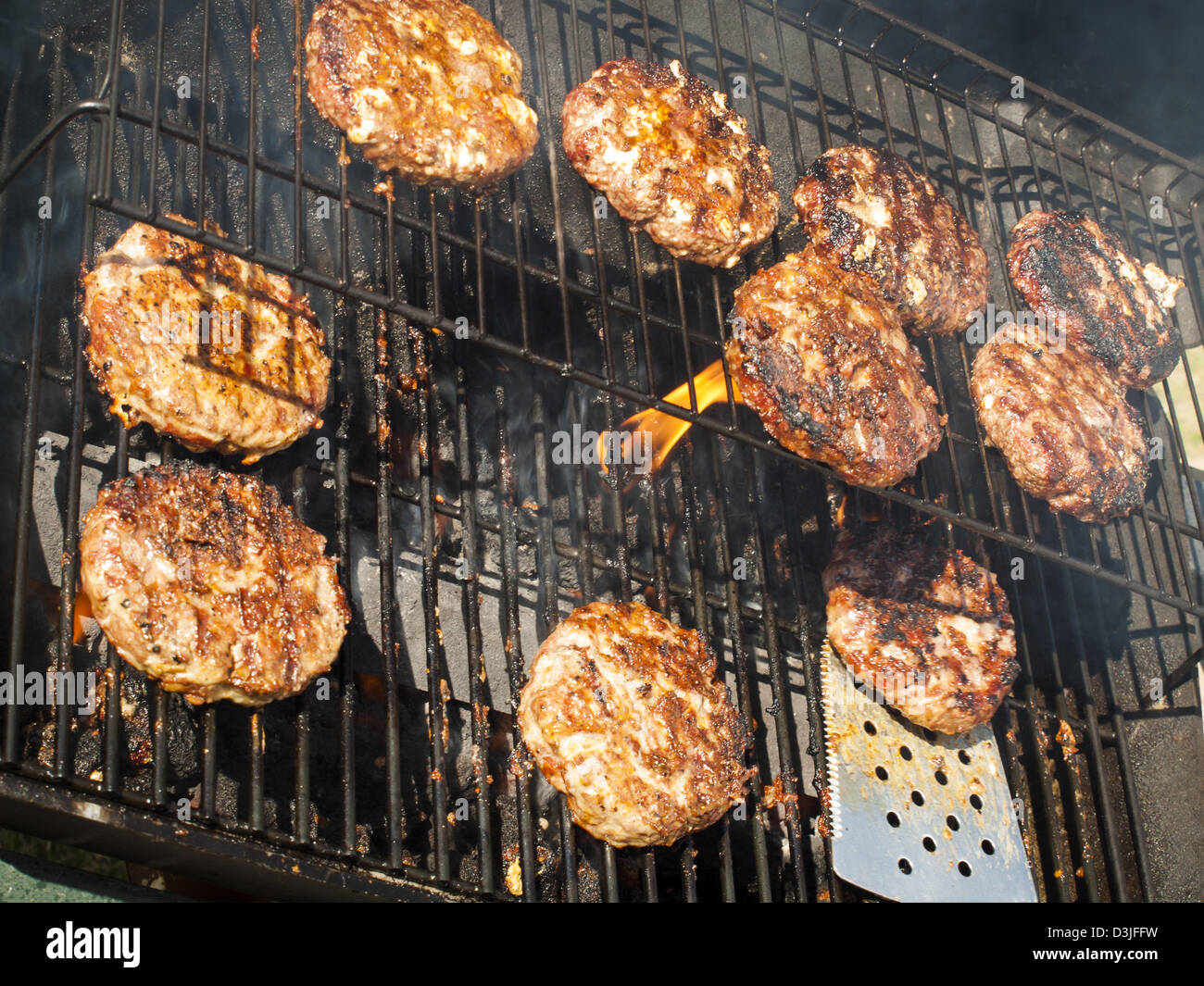 Gourmet hamburger parries on the grill Stock Photo - Alamy