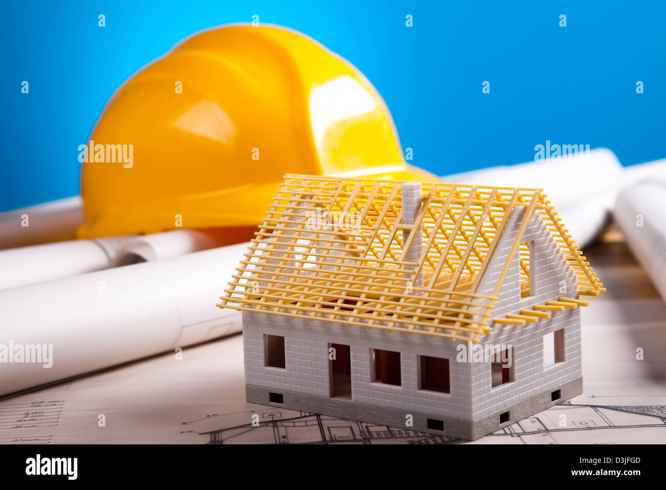 Architecture plans,house project and yellow hard hat Stock Photo - Alamy