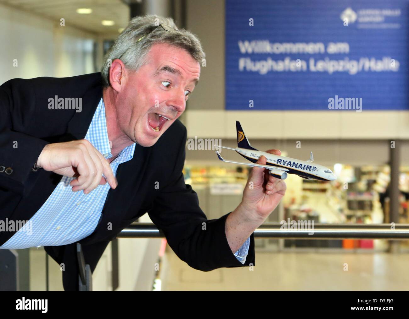 Ryanair CEO Michael O'Leary poses with a Ryanair model plane at a press ...