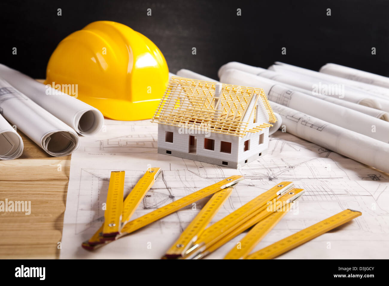 Architectural plans of house and hard hat Stock Photo - Alamy