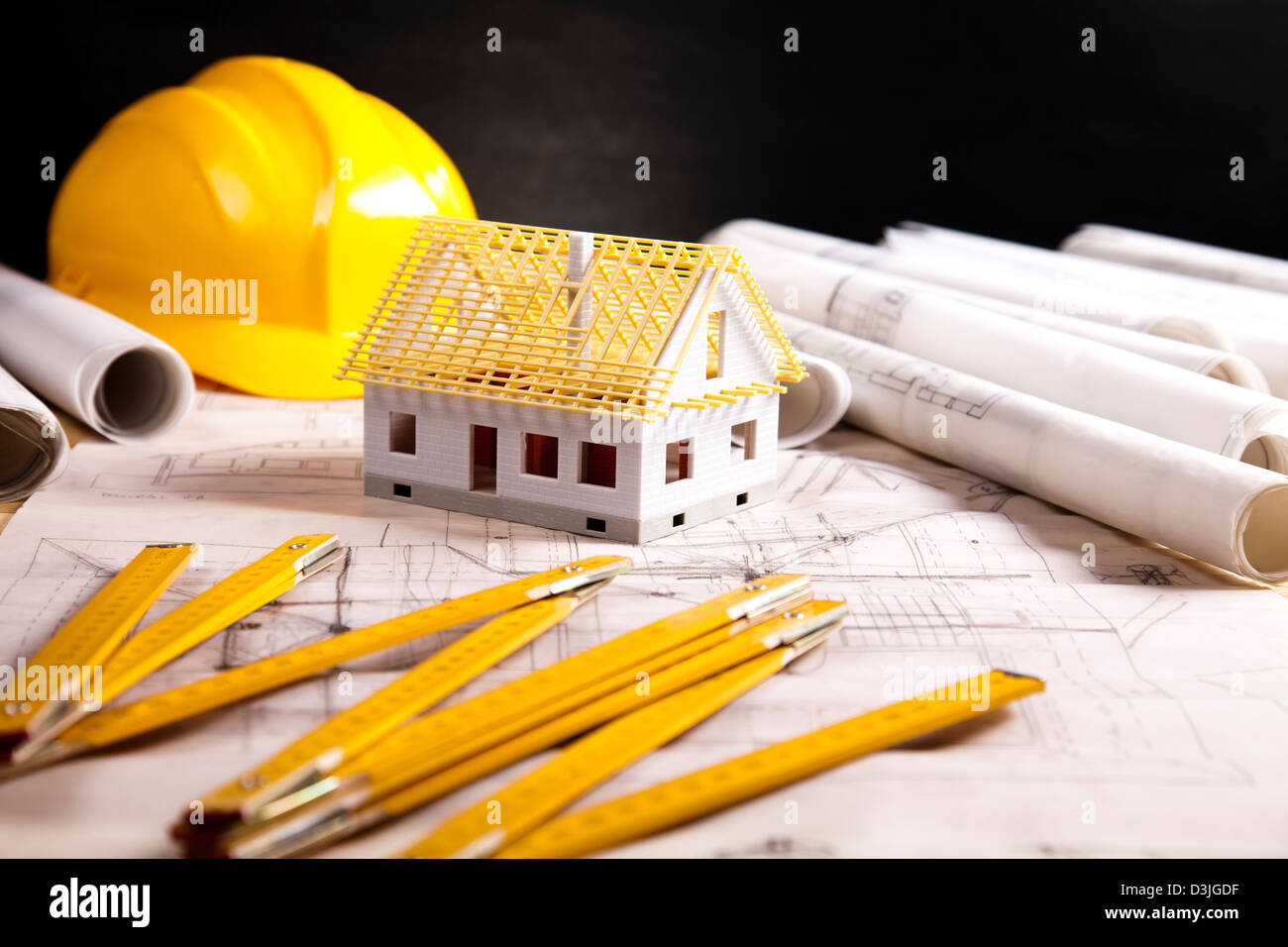 Architectural plans of house and hard hat Stock Photo - Alamy