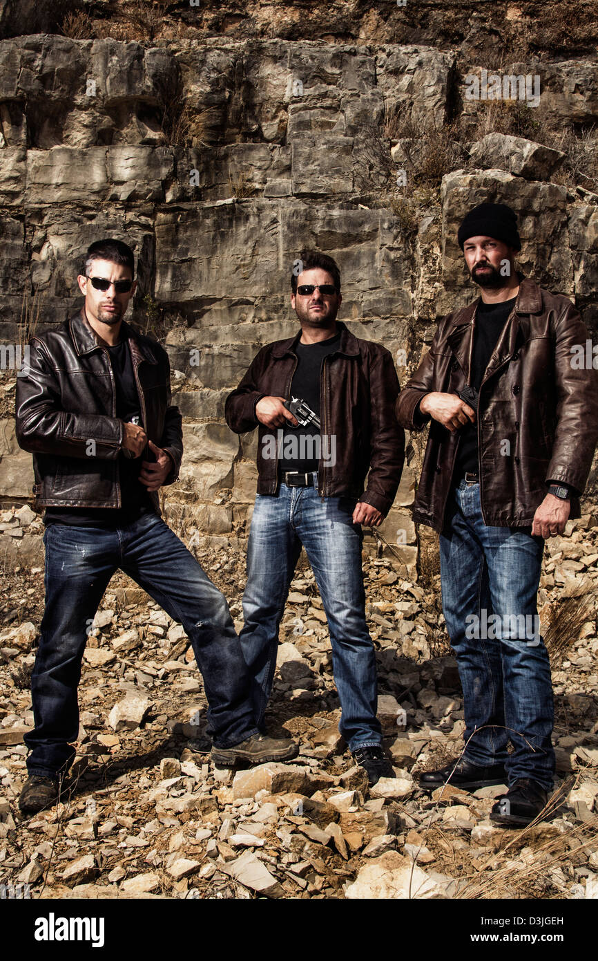 View of a group of gang members with guns Stock Photo - Alamy