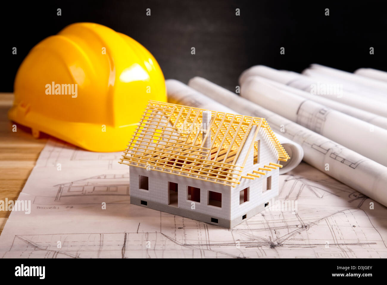 Architectural plans of house and hard hat Stock Photo - Alamy