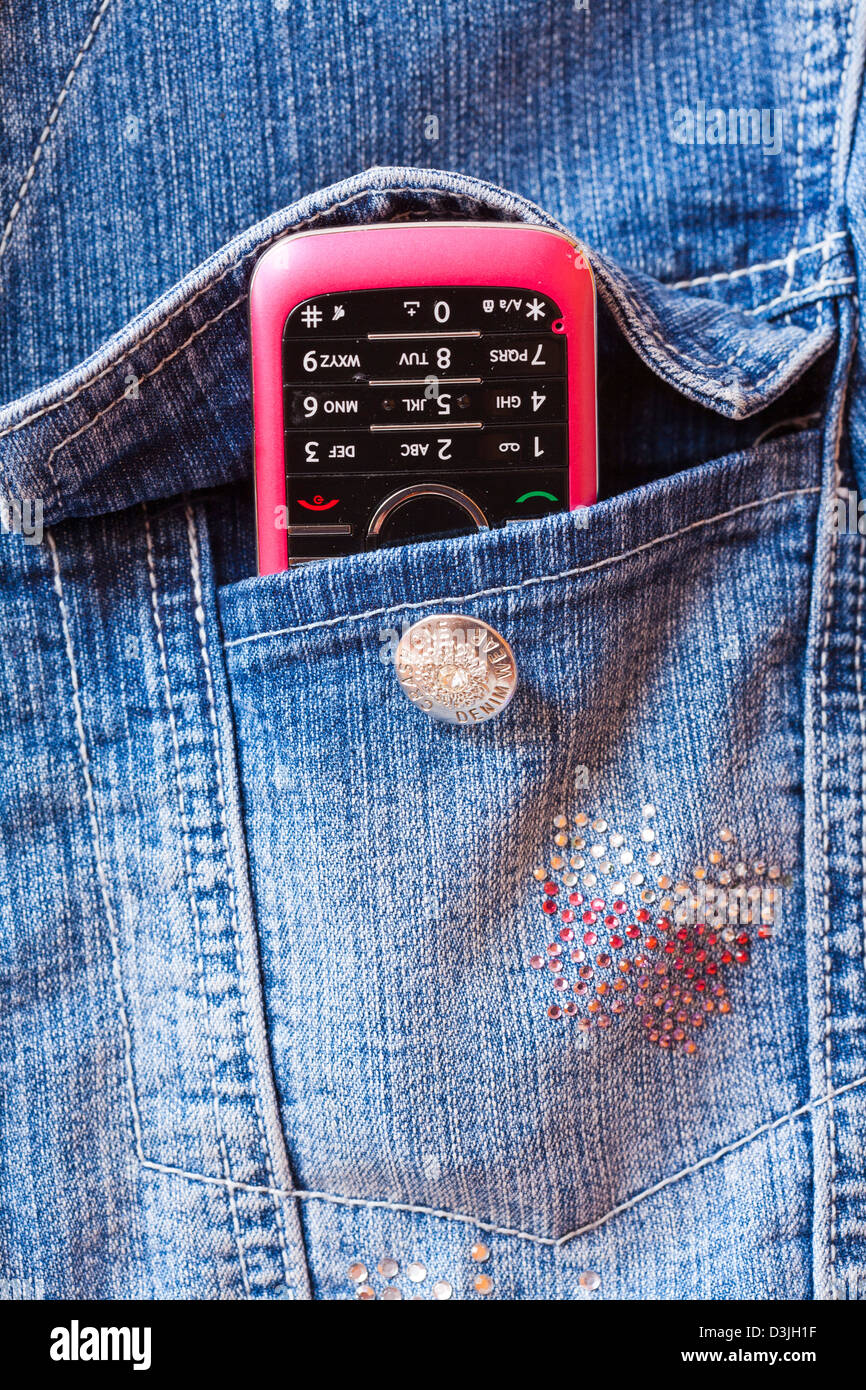 Phone in a pocket Stock Photo - Alamy