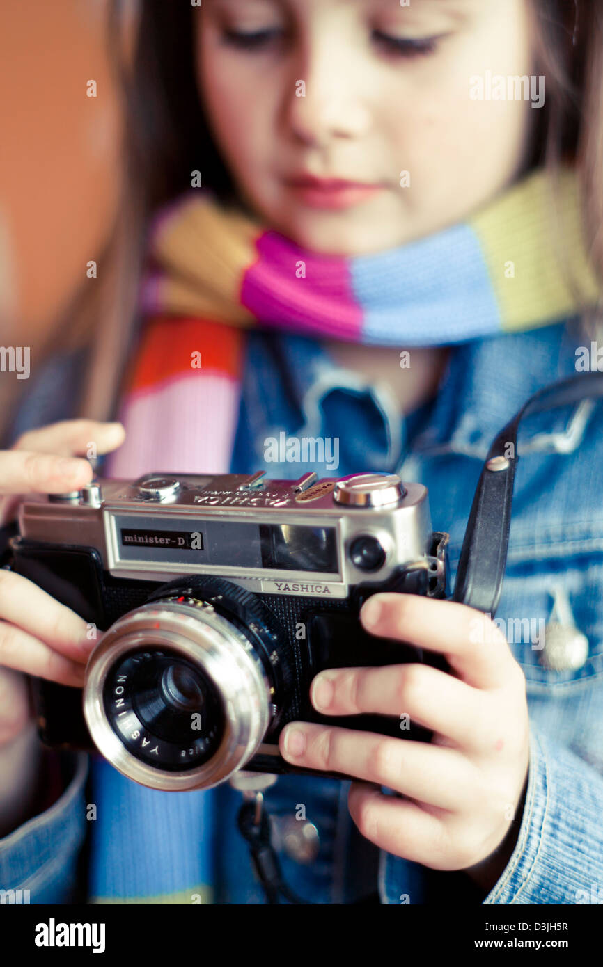 Girl with a vintage camera Stock Photo - Alamy