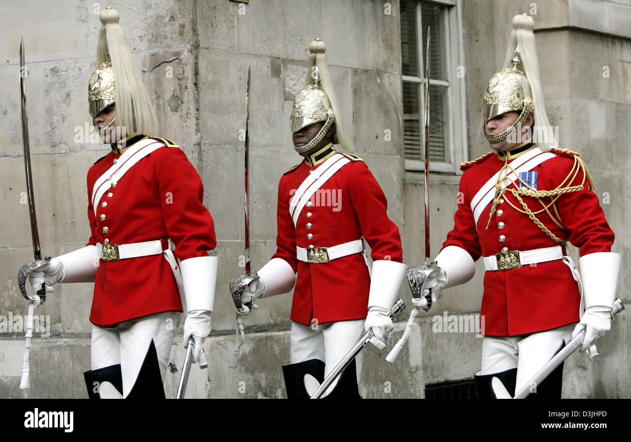 (dpa) - A photograph shows three typical guardians in London, England ...