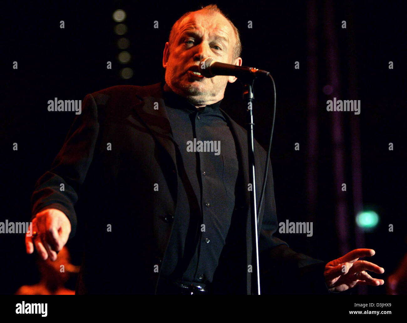 (dpa) - Blus and rock legend Joe Cocker performs on stage during a ...