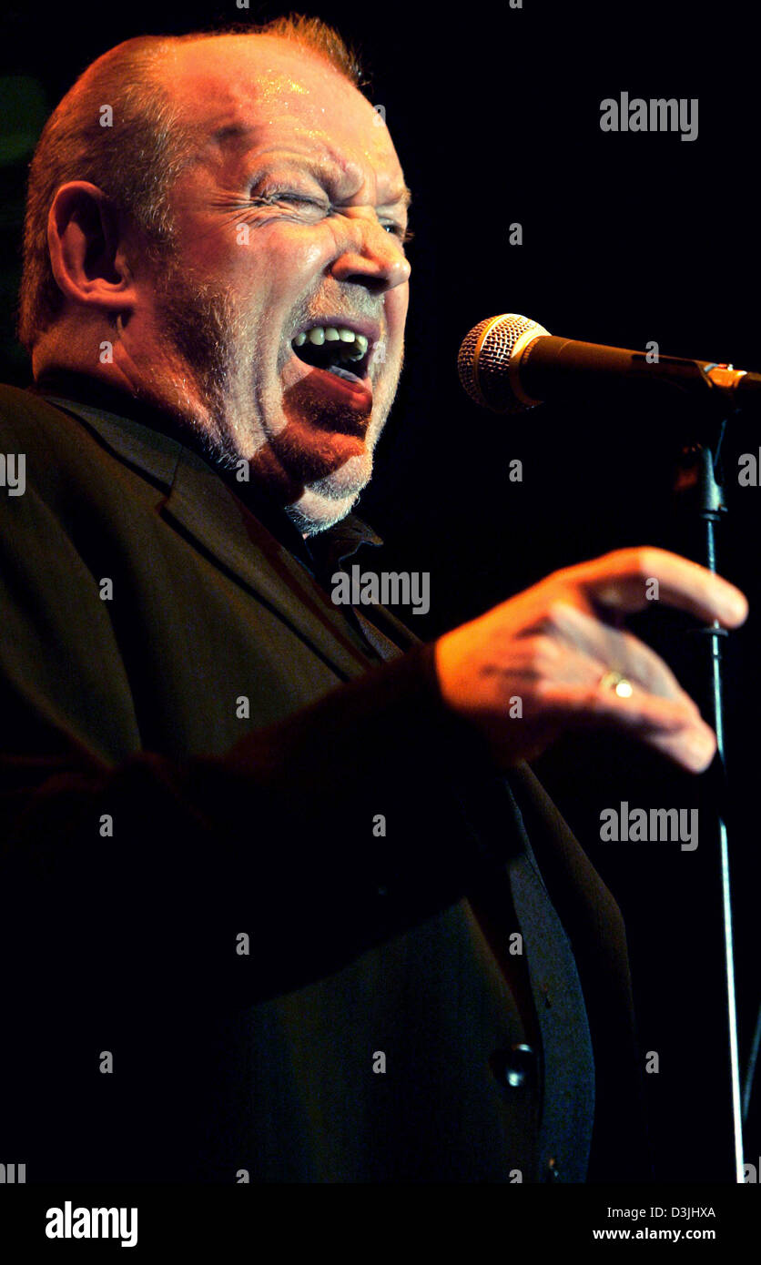 (dpa) - Blus and rock legend Joe Cocker performs on stage during a ...