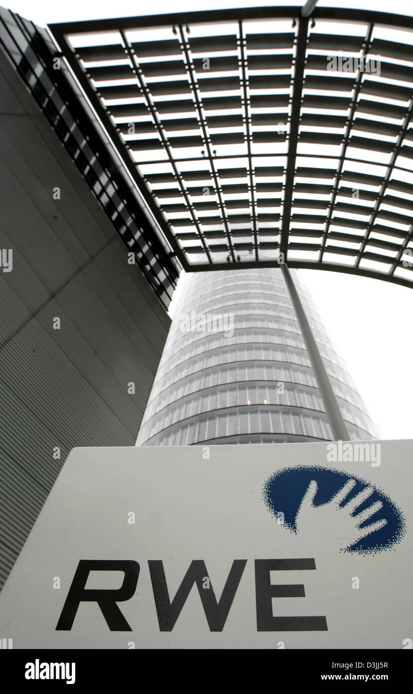 (dpa) - The headquarter of RWE AG towers above the company's logo in ...