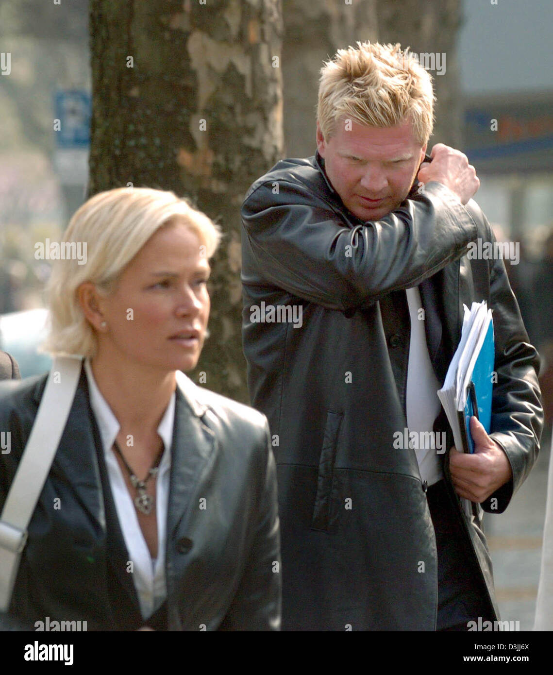 Former German soccer star Stefan Effenberg(R) in company of his wife ...