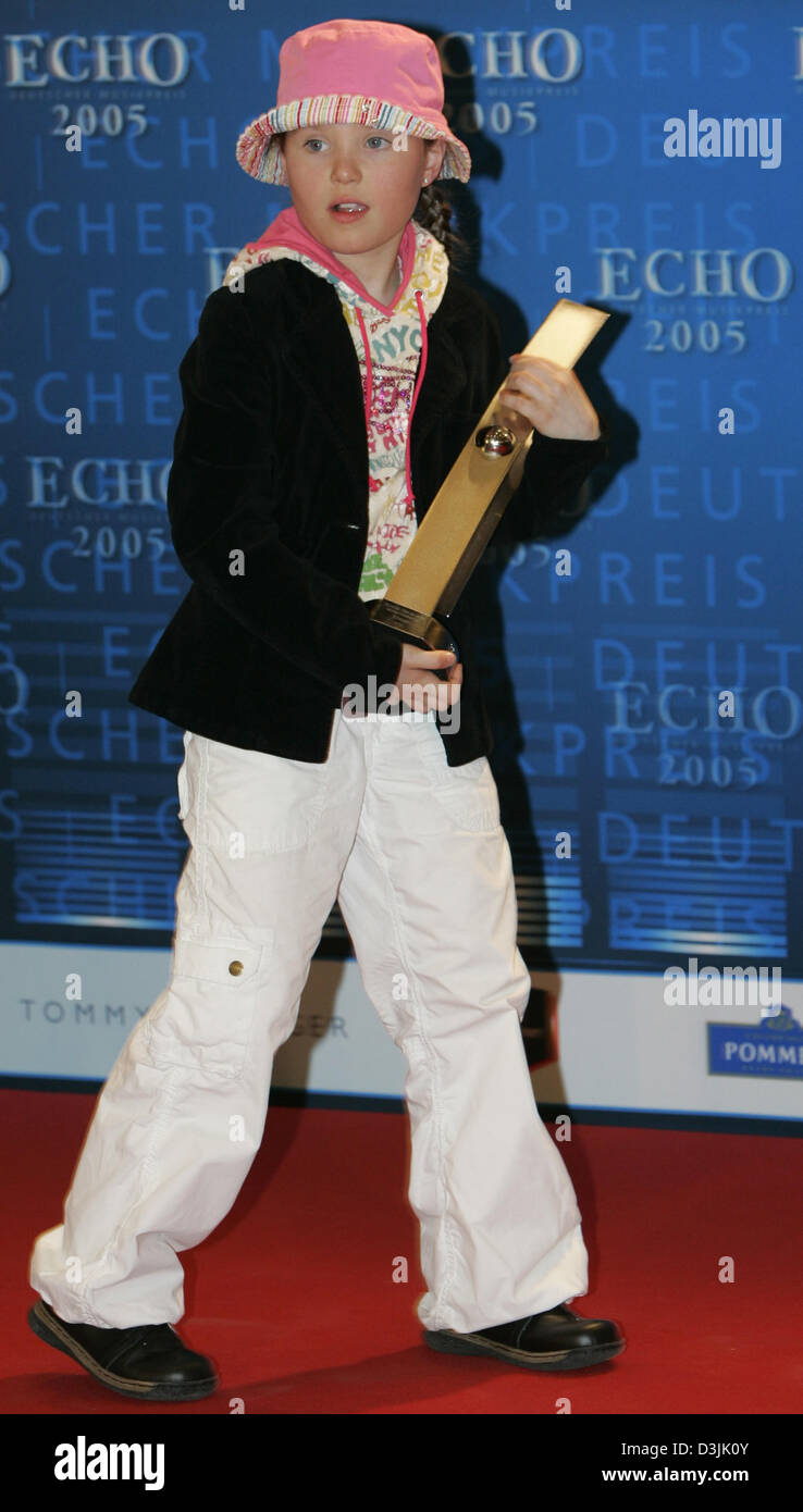 (dpa) - Newcomer singer Joy holds her award in her hands which she won ...