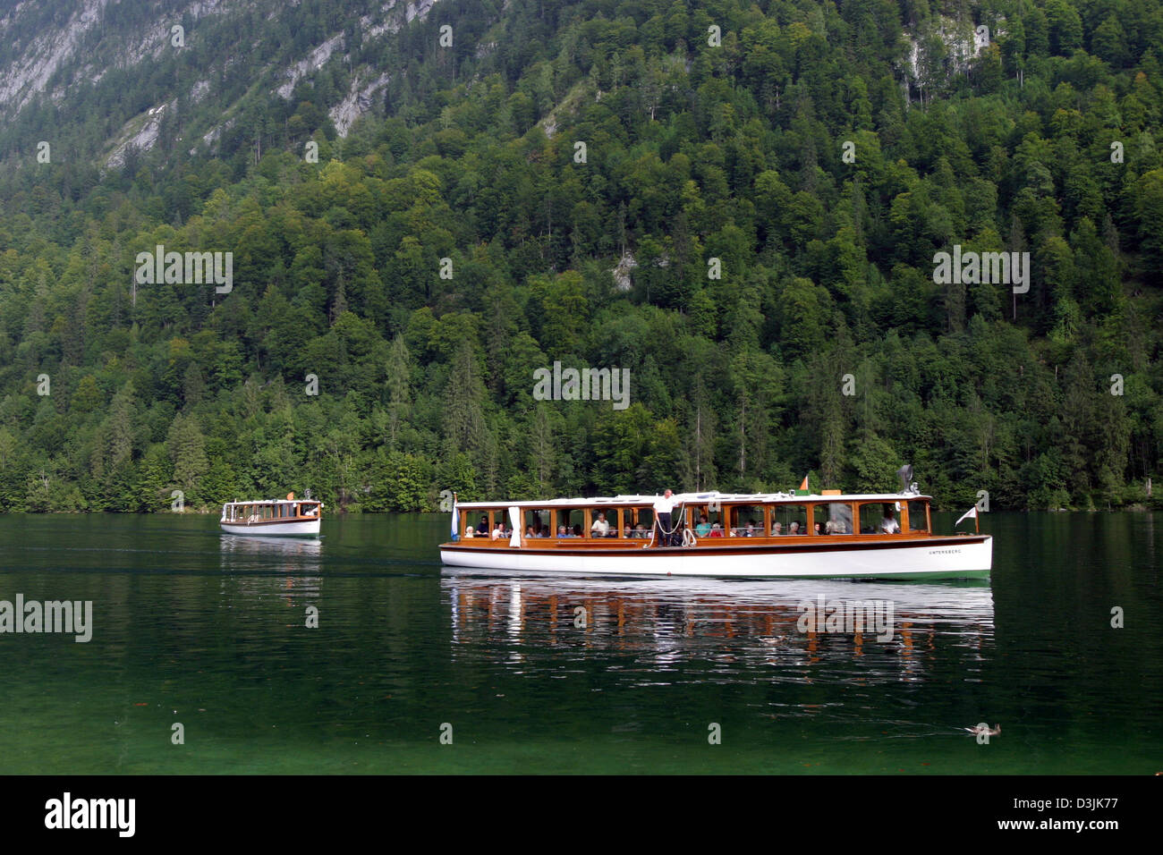 (dpa) - An excursion boat pictured on the Koenigsee lake between the ...