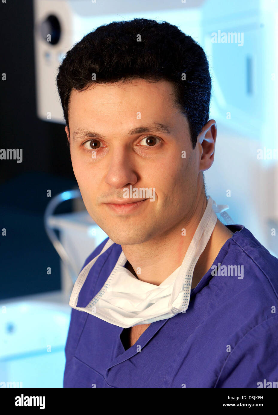 (dpa) - Eye surgeon, doctor med Suphi Taneri, pictured in the operating ...