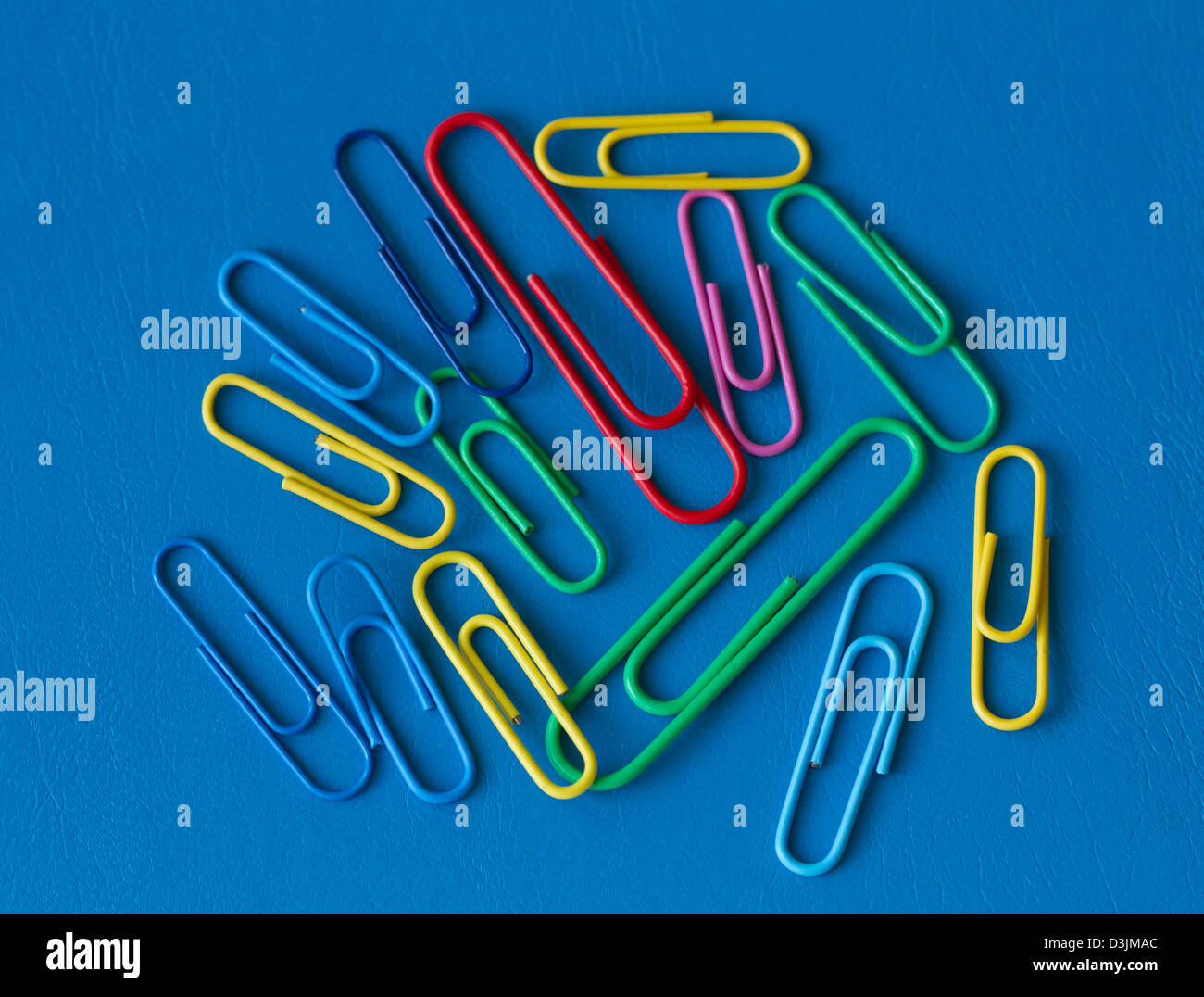 Red paperclips hi-res stock photography and images - Alamy