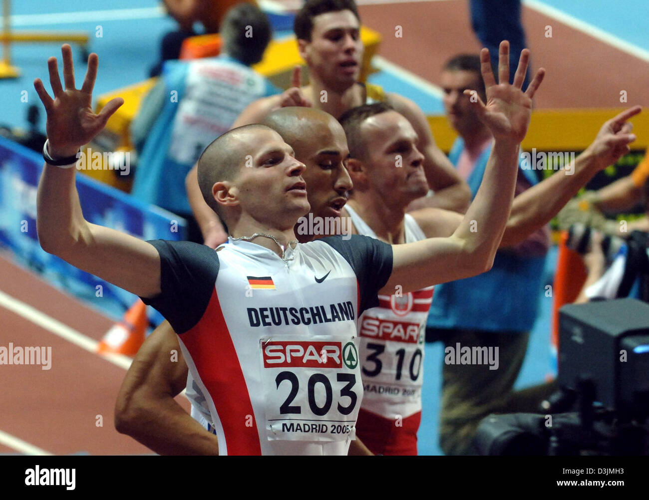 (dpa) - German runner Tobias Unger jubilates after winning the Men's ...
