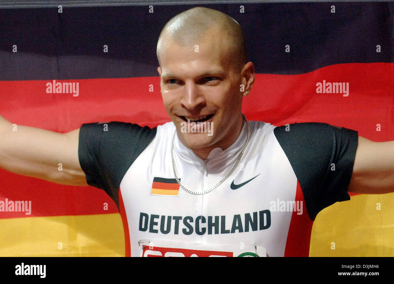 (dpa) - German runner Tobias Unger jubilates after winning the Men's ...