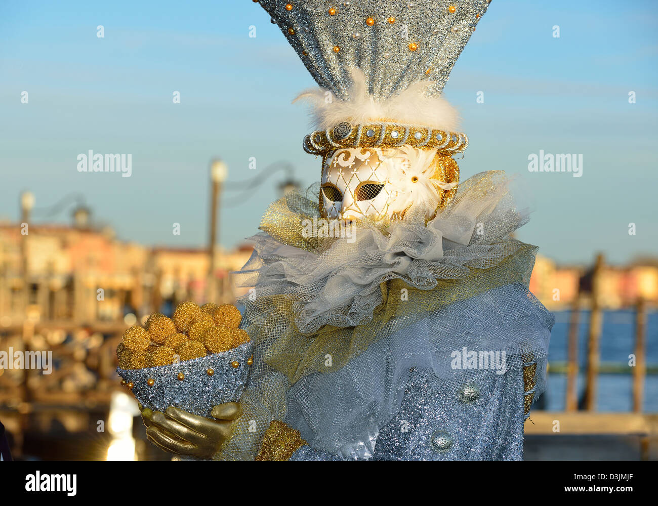 A bauta masks during 2013 carnival, note the sun shining on gondola's ...