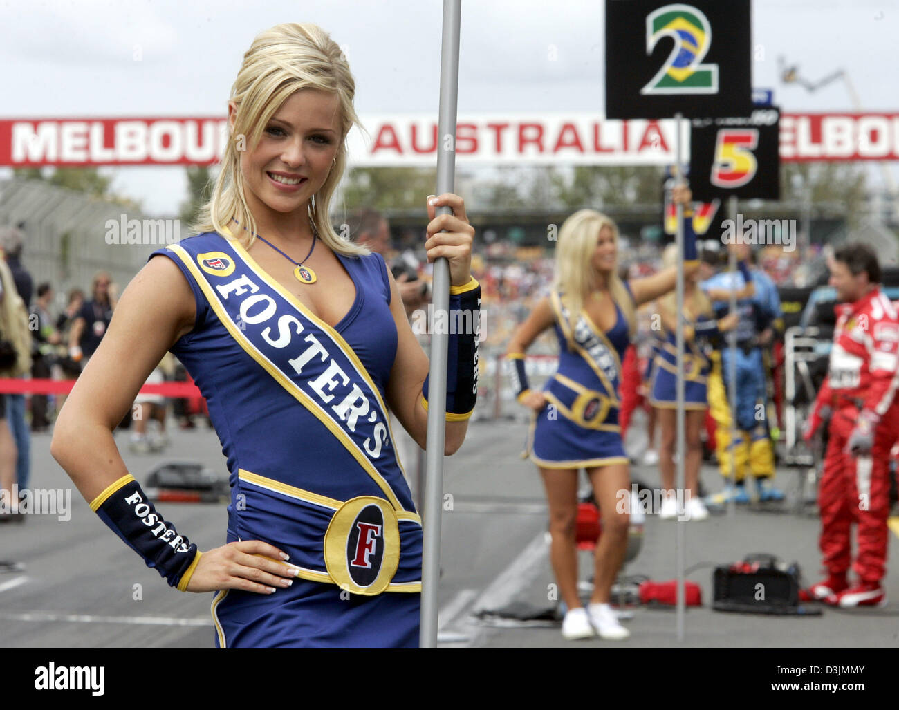 (dpa) - A Grid Girls stands on the starting grid before the Australian ...