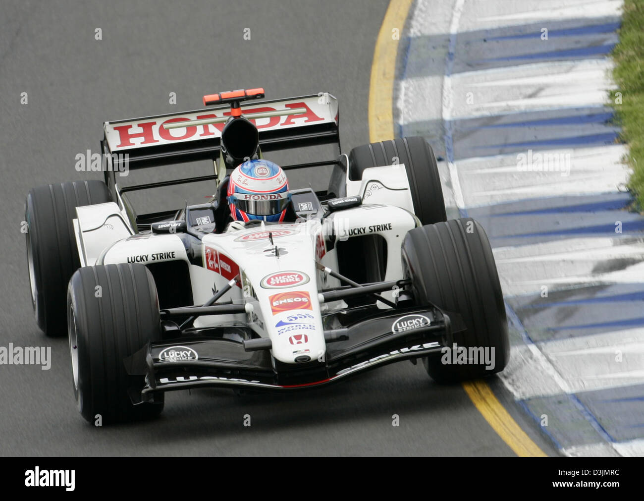 (dpa) - British Formula One driver Jenson Button drives his BAR Honda ...