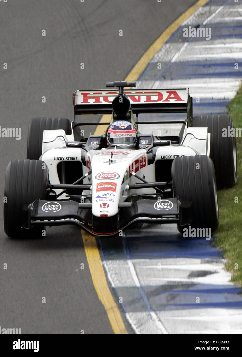 (dpa) - Japanese Formula One driver Takuma Sato drives his BAR Honda ...