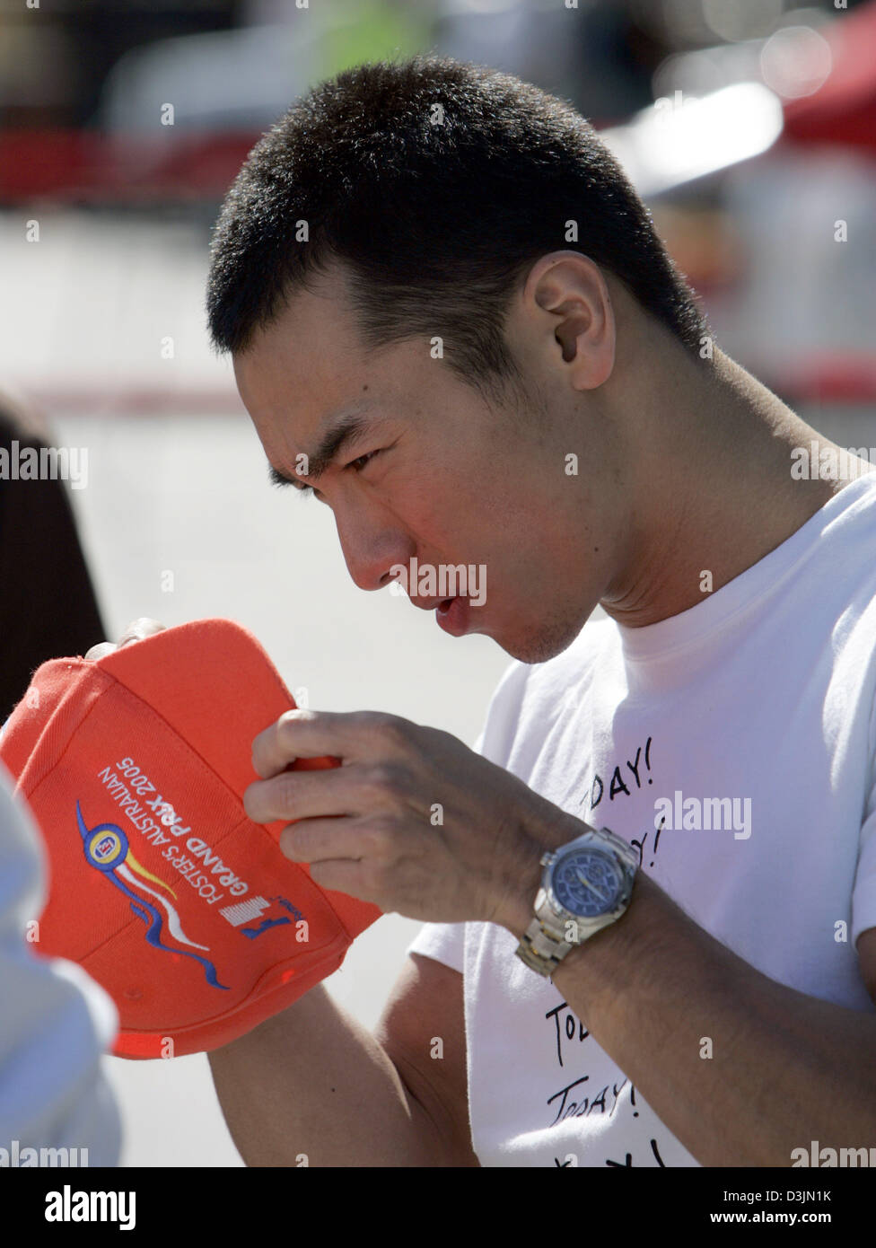 Japanese Formula One driver Takuma Sato (team BAR-Honda) signs ...