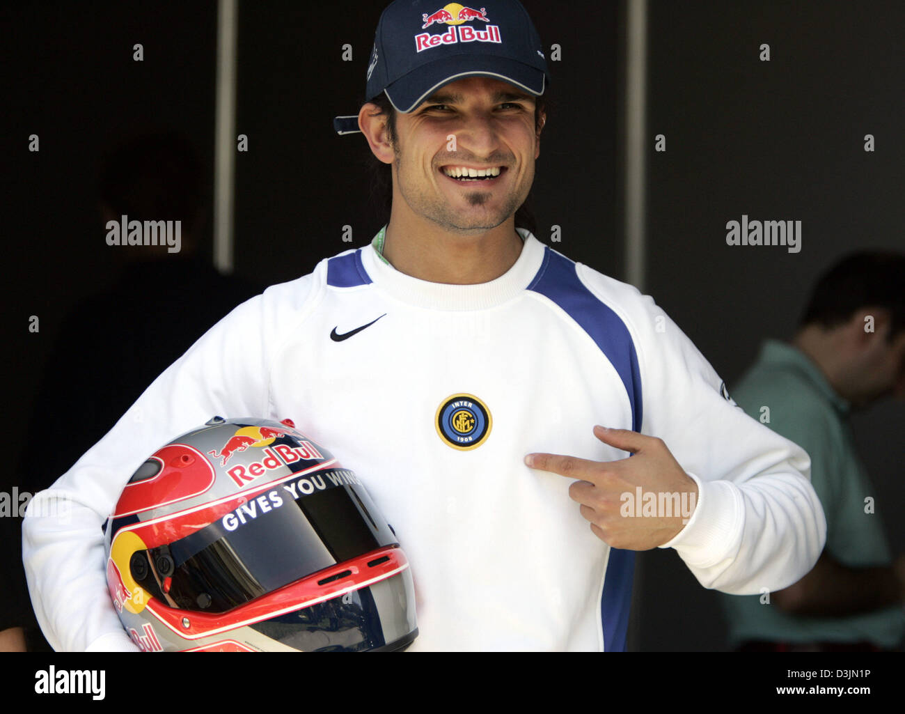 (dpa) - New Italian Formula One driver Vitantonio Liuzzi (team Red Bull) smiles at the ...