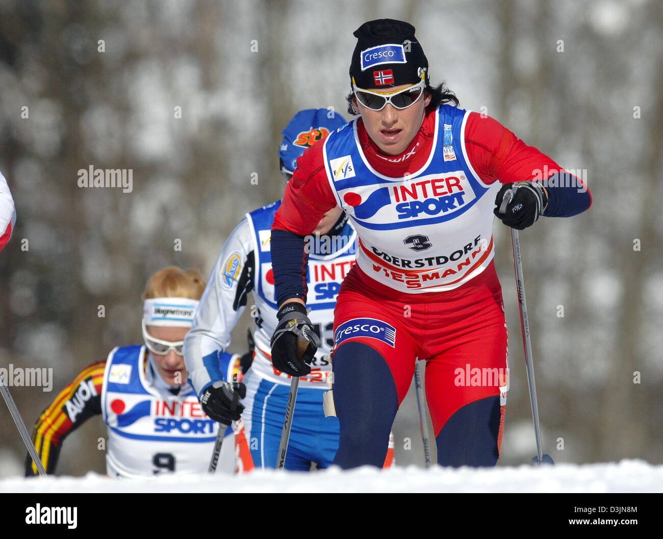 (dpa) - Norway's Marit Bjoergen (front) leads the field during the ...