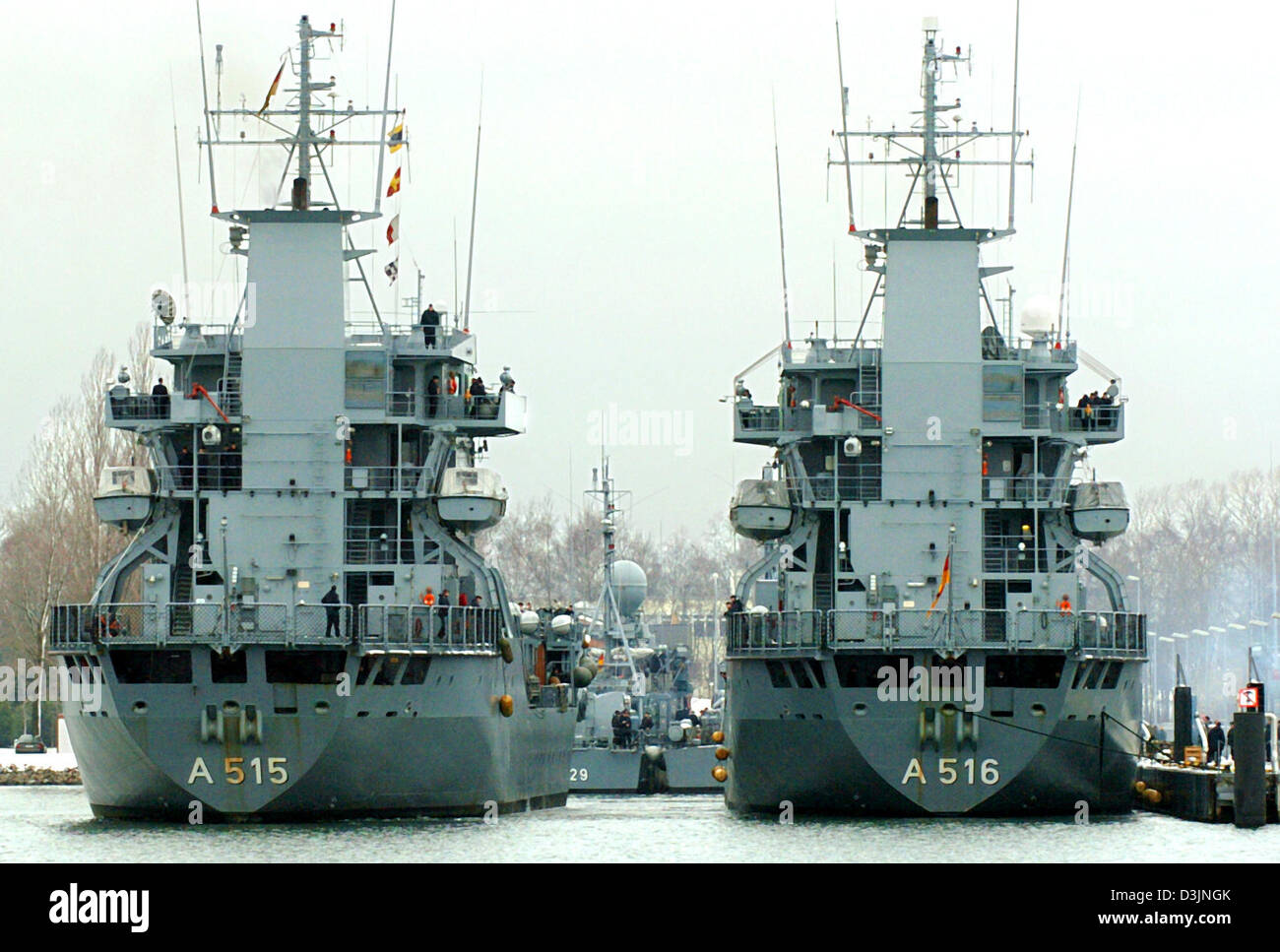 (dpa) - Two supply vessels are docked at the pier at the German navy ...