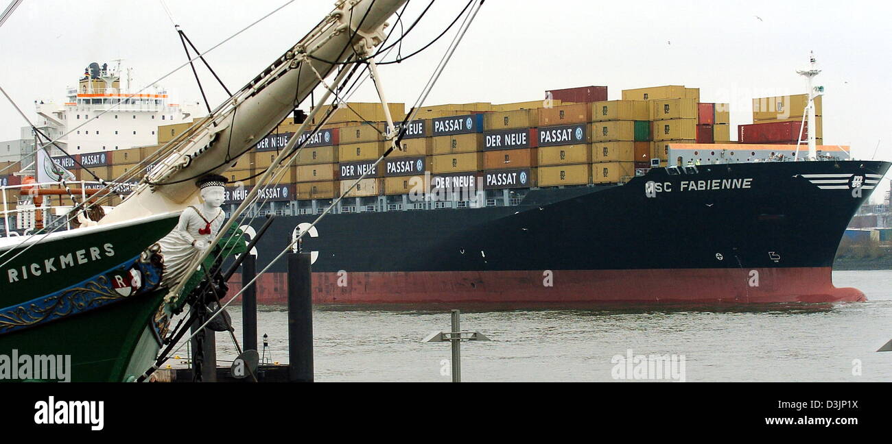 (dpa) - Container ship 'MSC Fabienne' features large posters announcing ...