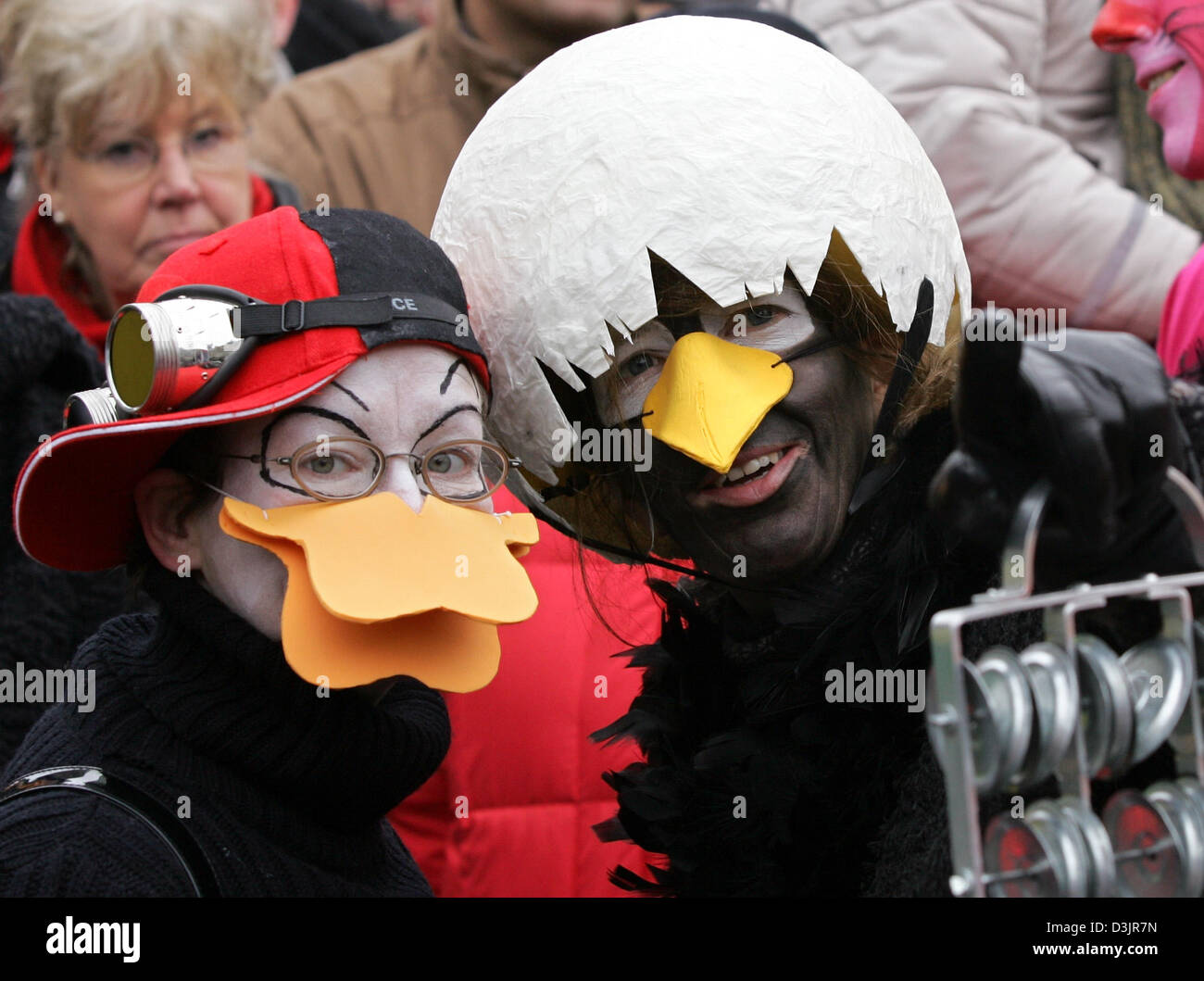 (dpa) - Two women clad in duck and fledgling costumes attend the ...