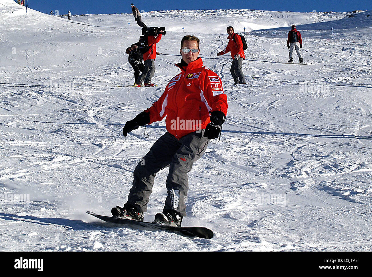 (dpa) - German formula one driver Michael Schumacher snowboards in the ...