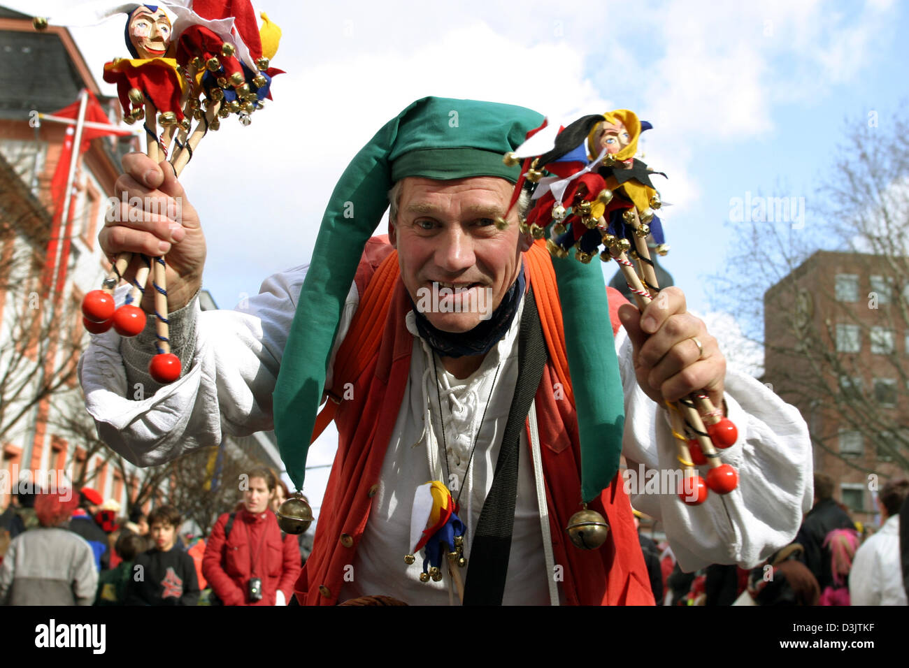 (dpa) - A man dressed up as Till Eulenspiegel celebrates Monday after ...