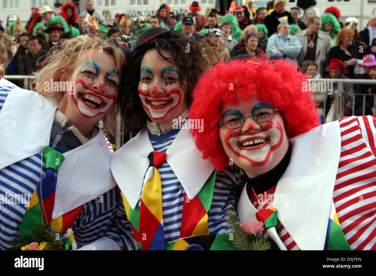 (dpa files) - Young women dressed up as clowns celebrate Monday after ...
