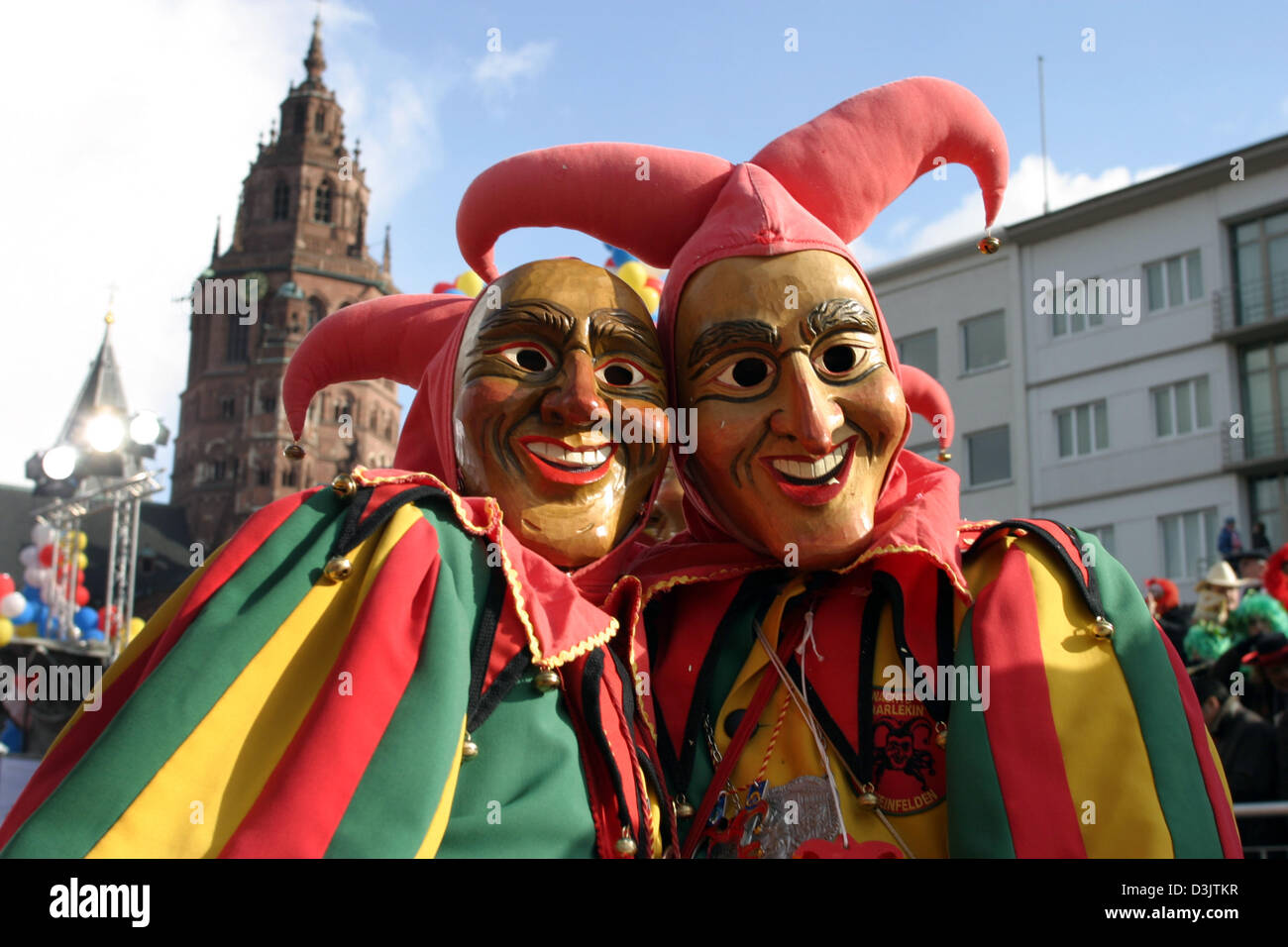 (dpa files) - Two people dressed up as jokers celebrate Monday after ...