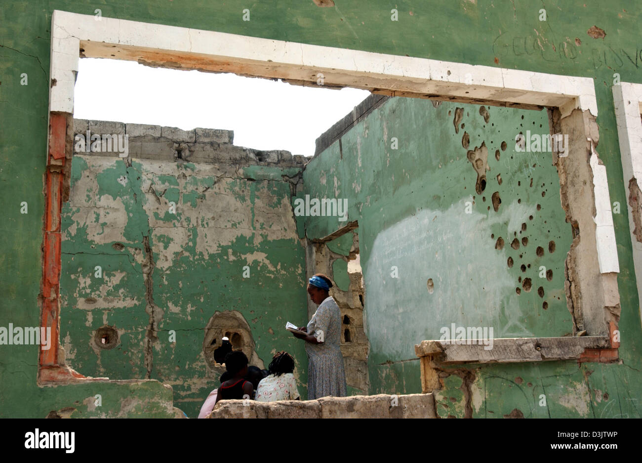 (dpa) - School lessons in a bullet-riddled building in the totally ...