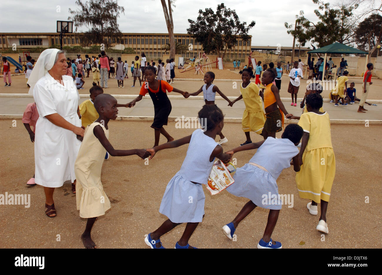 (dpa) - Sister Yolanda dances with girls at an orphanage which is led ...