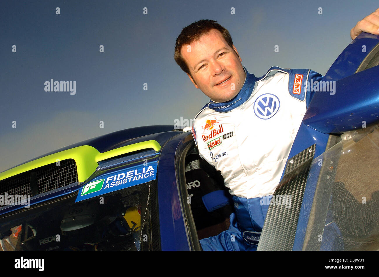 (dpa) - US rally driver Robby Gordon poses for a picture as he stands ...