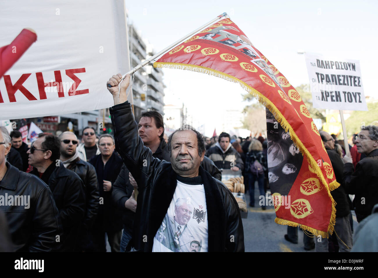 Thessaloniki, Greece. 20th February 2013. Protester waves a communist ...
