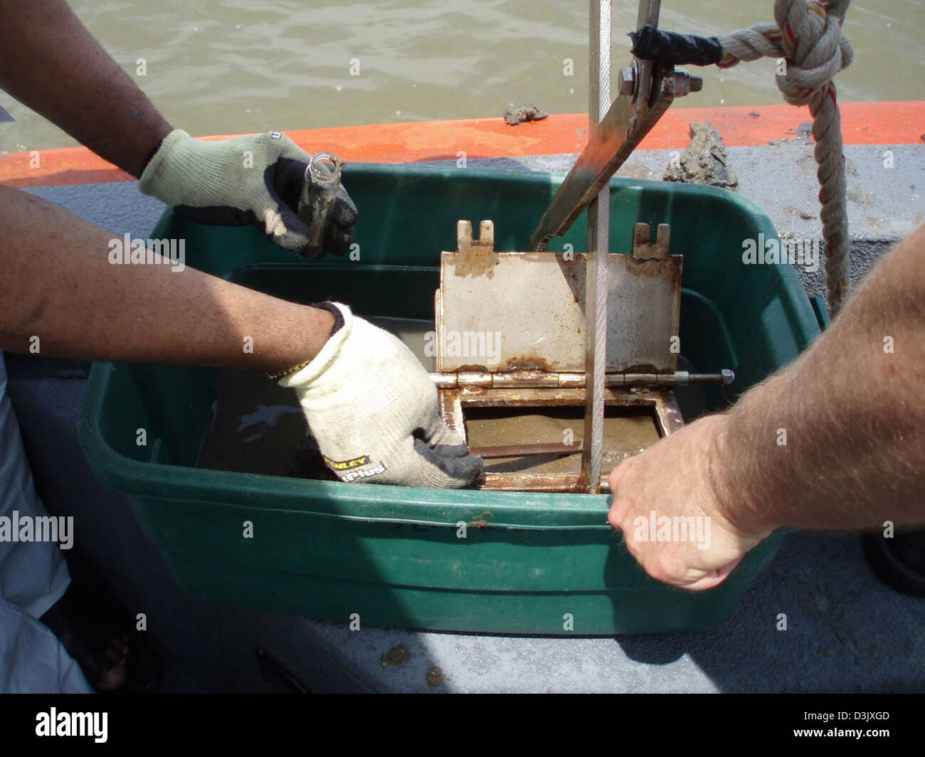 NOAA Mussel Watch: Collecting a Sediment Sample Stock Photo - Alamy
