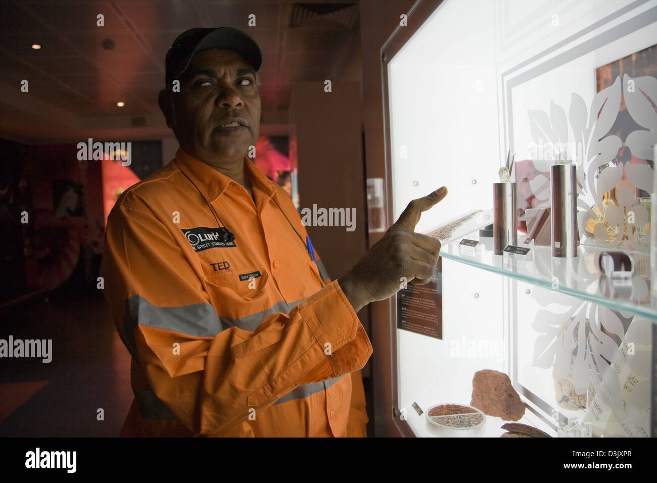 Tour Director Ted Hall points out a display at the Argyle Diamond ...