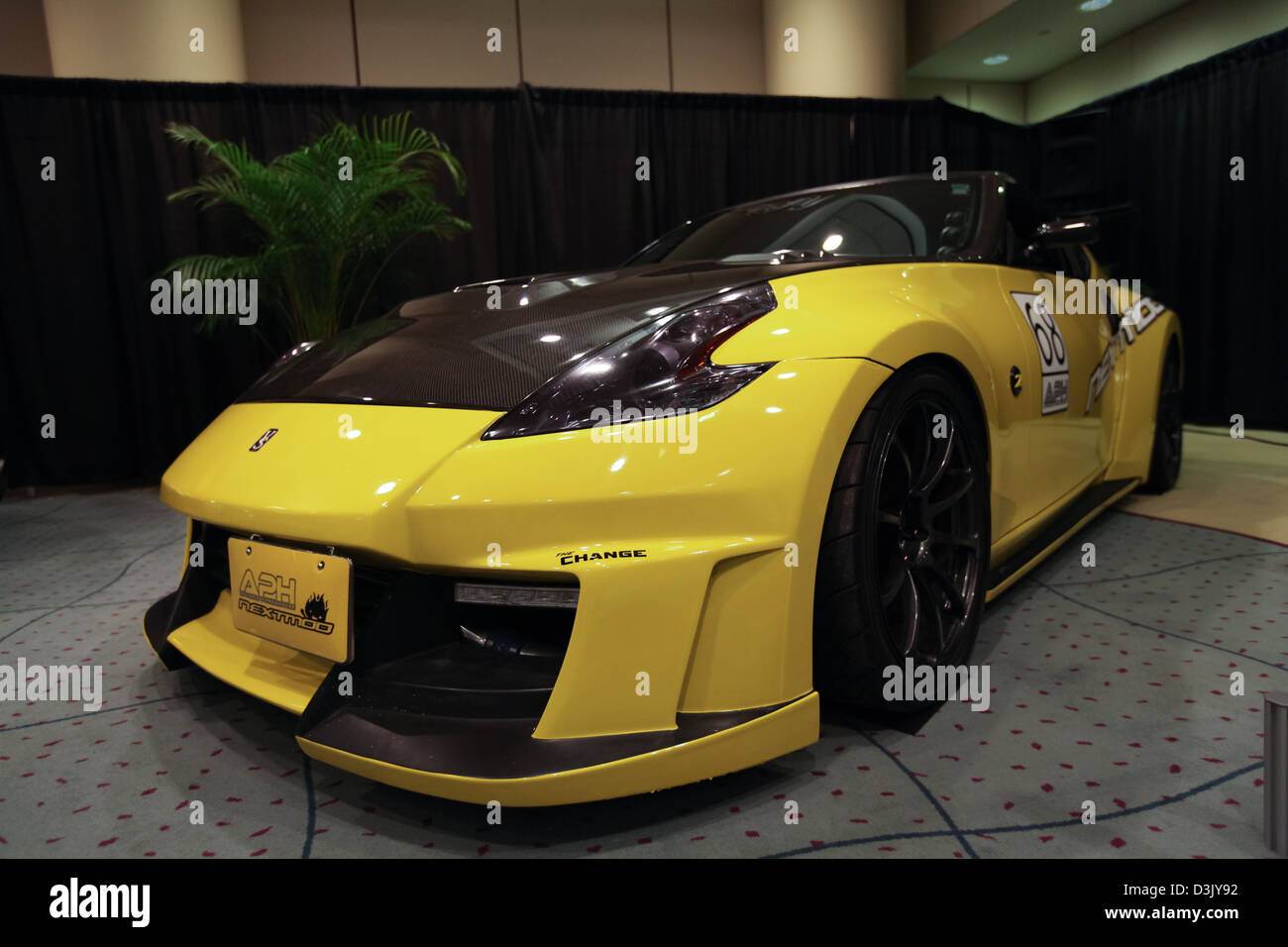 modified import race car yellow Stock Photo - Alamy