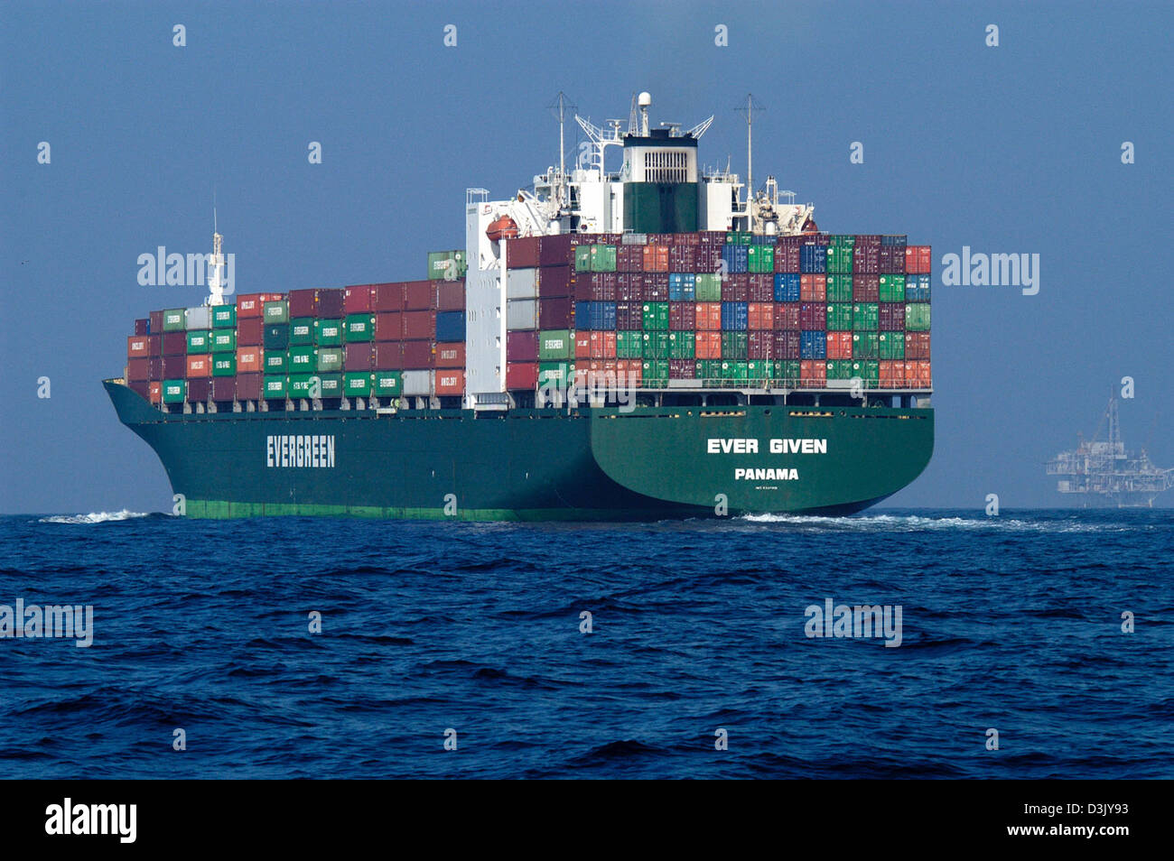 A container ship navigates through the currents of the ocean, with real ...