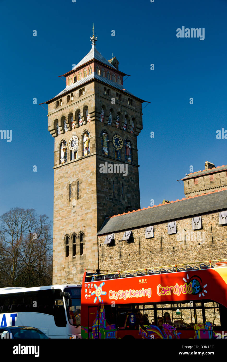 Clock Tower of Cardiff Castle and tour bus, Cardiff, Wales, UK Stock ...