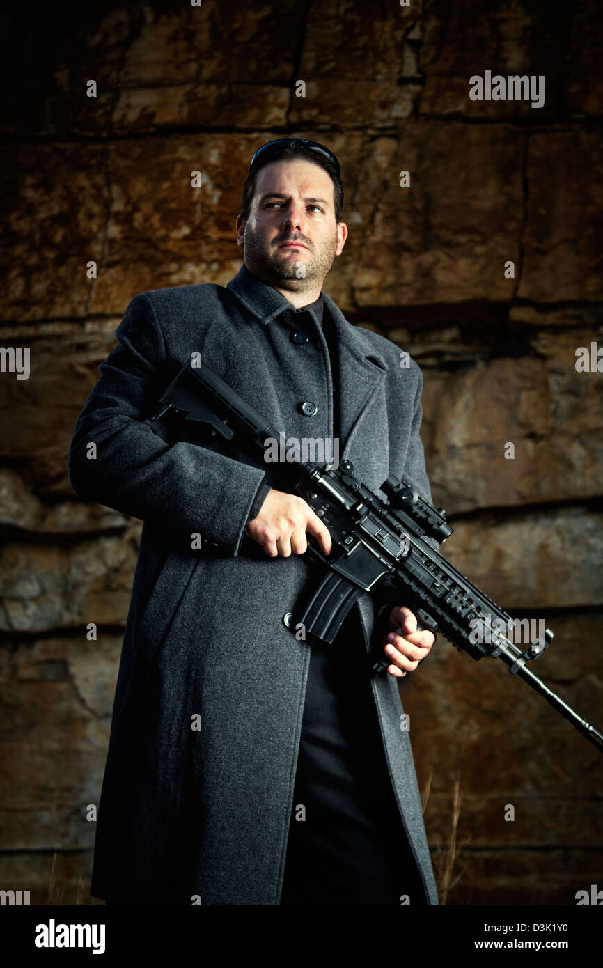 View of a contracted type killer agent wandering with a long jacket and ...