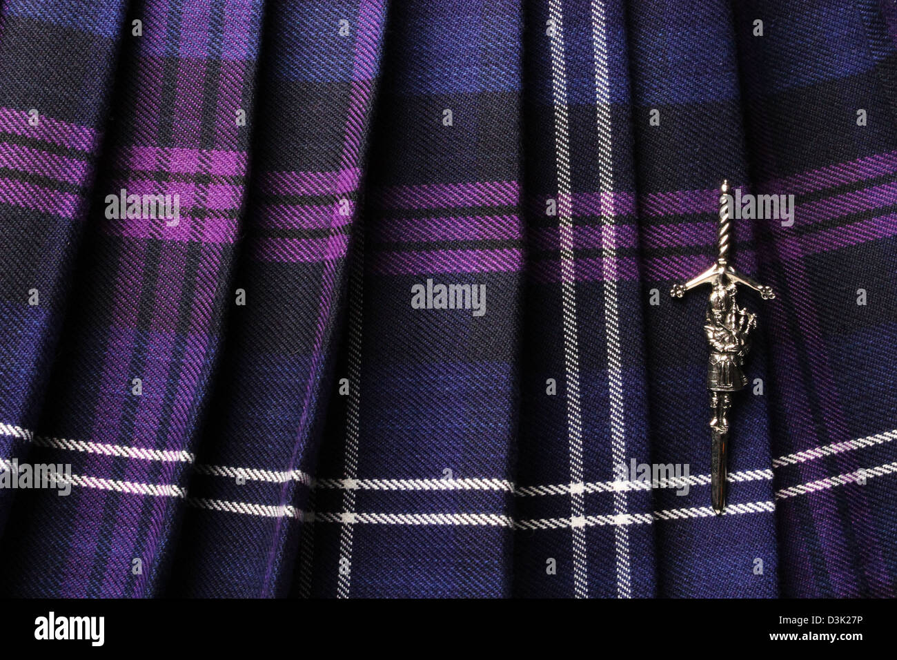 Purple Kilt With Bagpiper Pin Stock Photo - Alamy