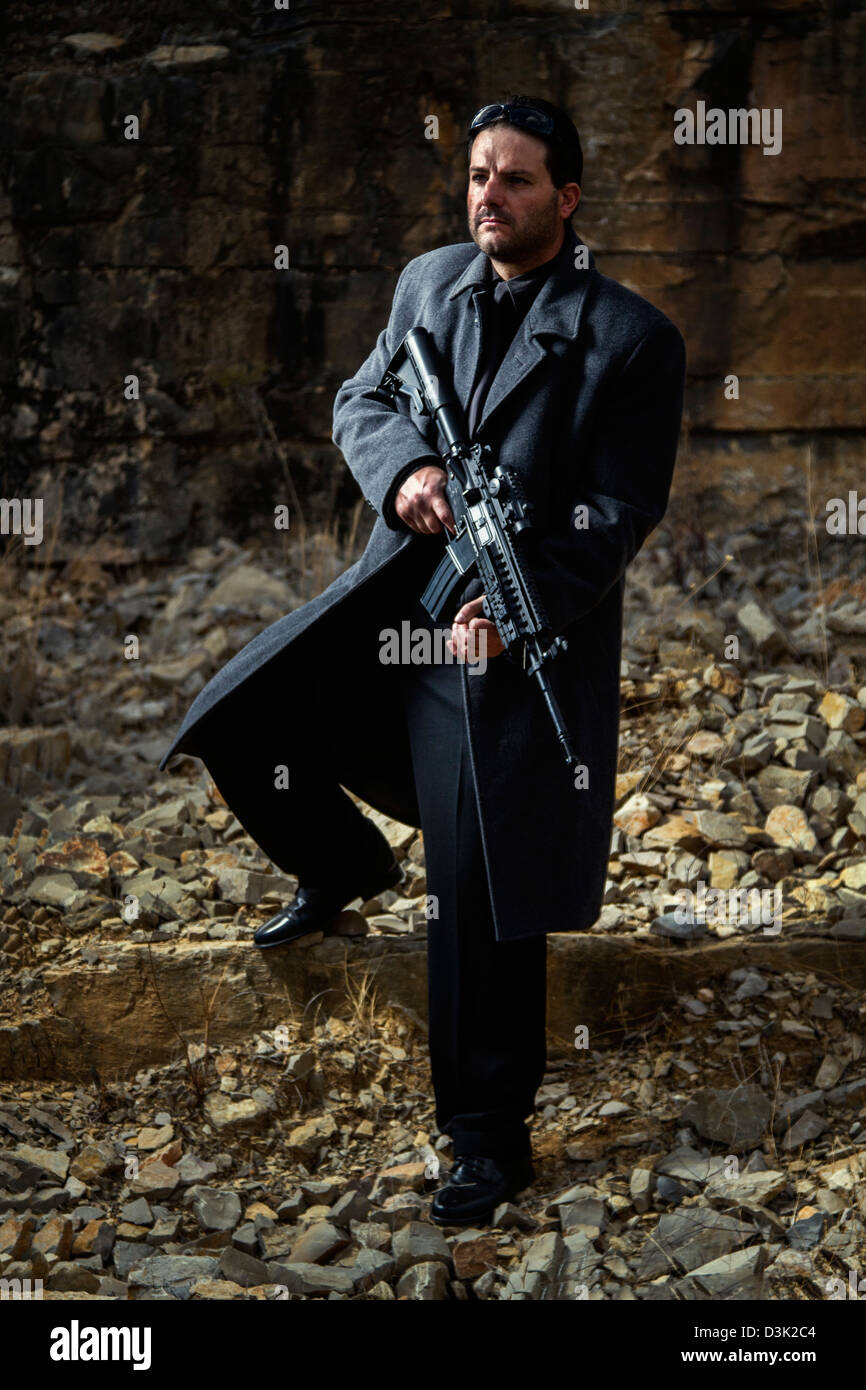 View of a contracted type killer agent wandering with a long jacket and ...