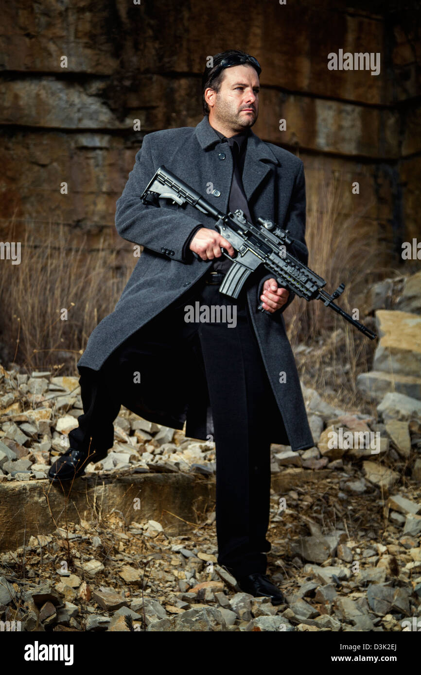 View of a contracted type killer agent wandering with a long jacket and ...