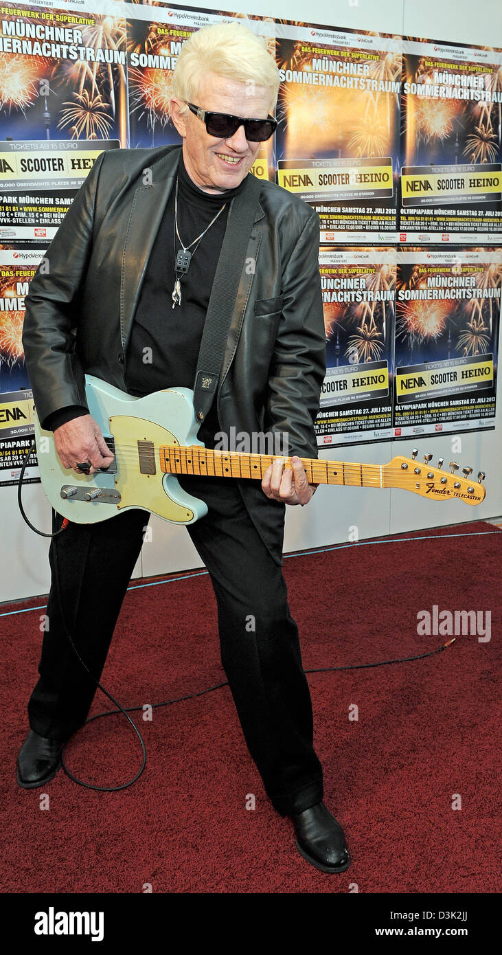 German singer Heino poses with a Fender Telecaster guitar during a ...